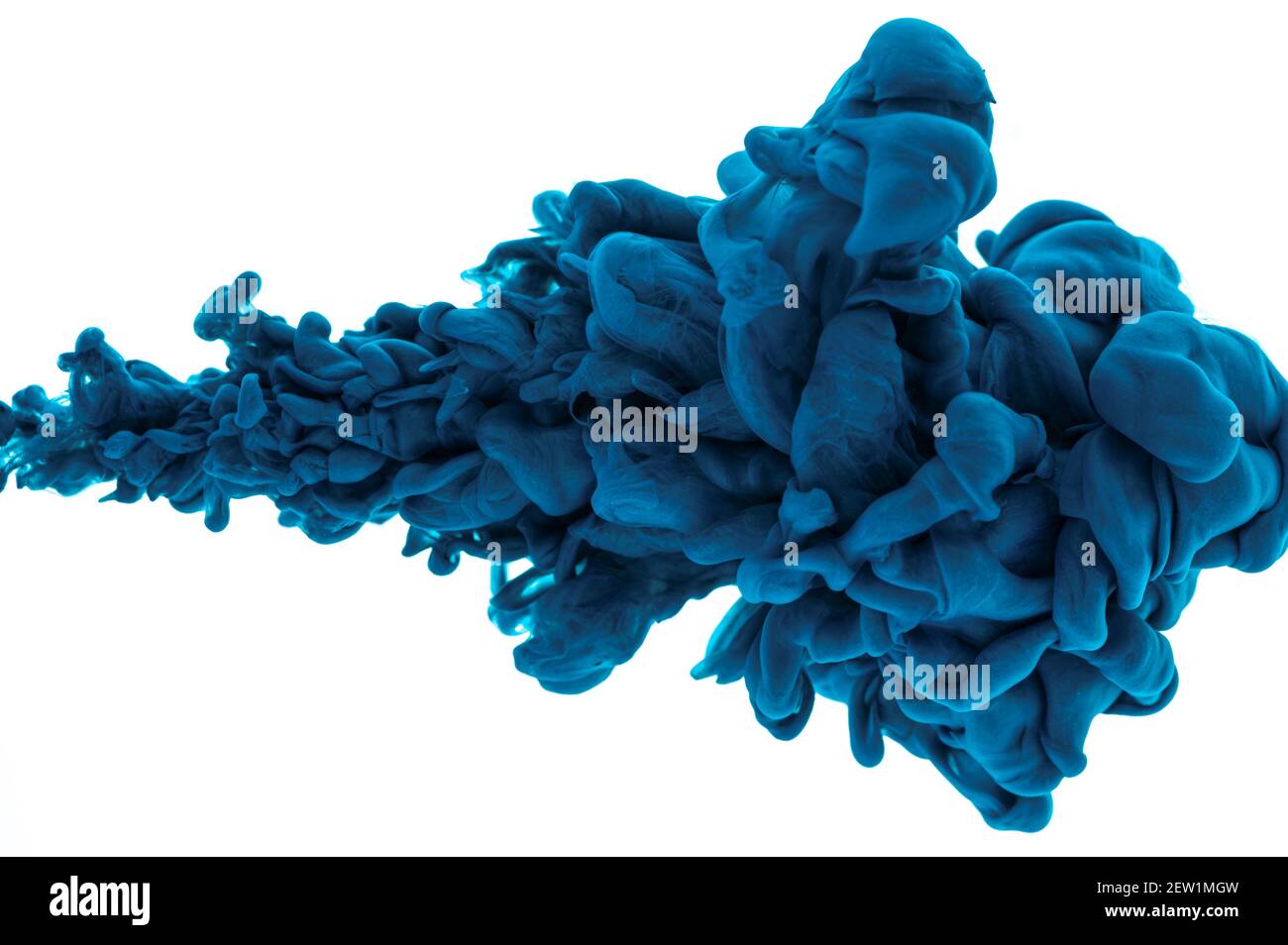 Blue acrylic ink in water on white isolated background frozen motion ...
