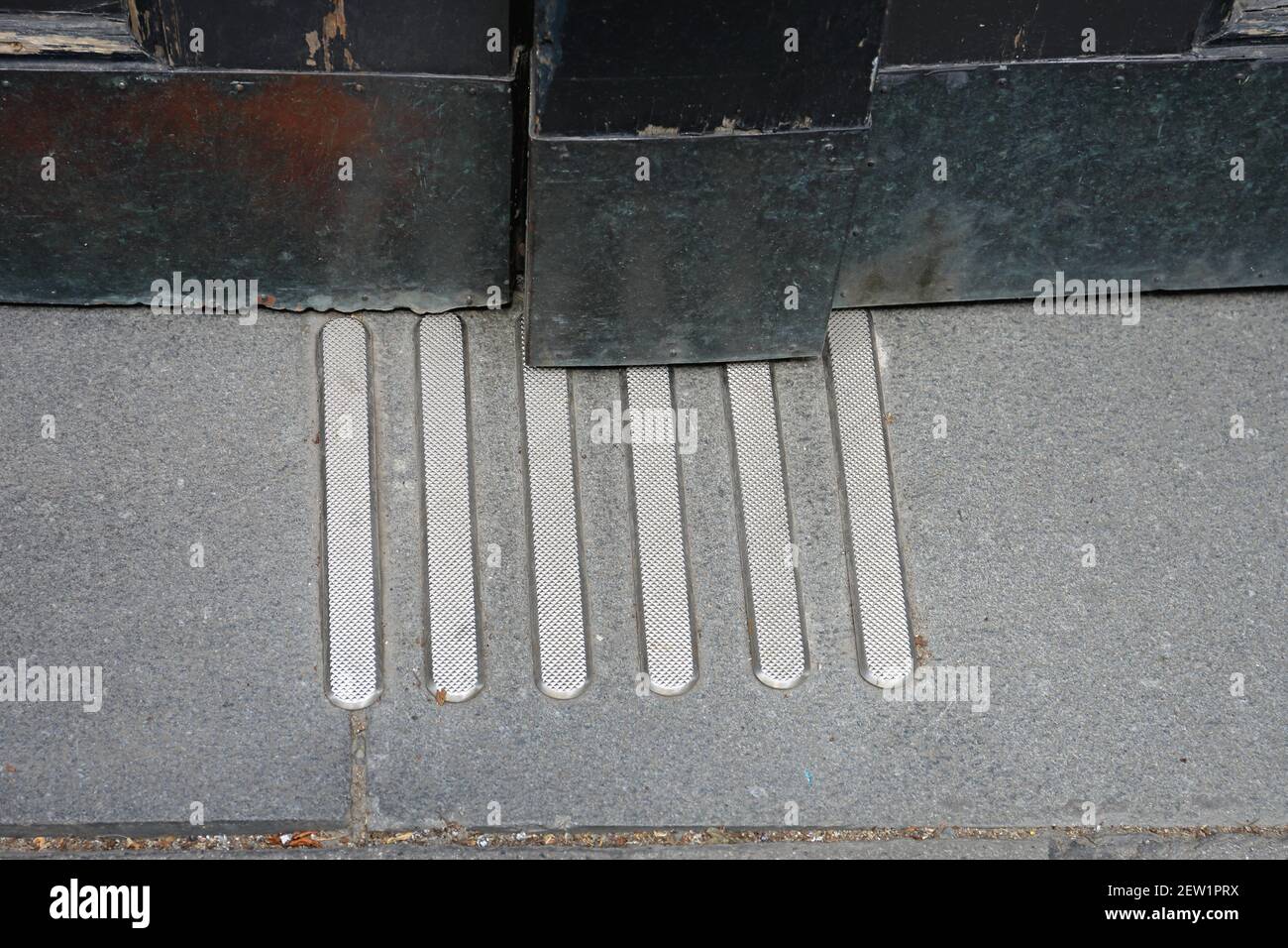 Anti Slip Metal Strips at Street Pavement Safety Stock Photo - Alamy