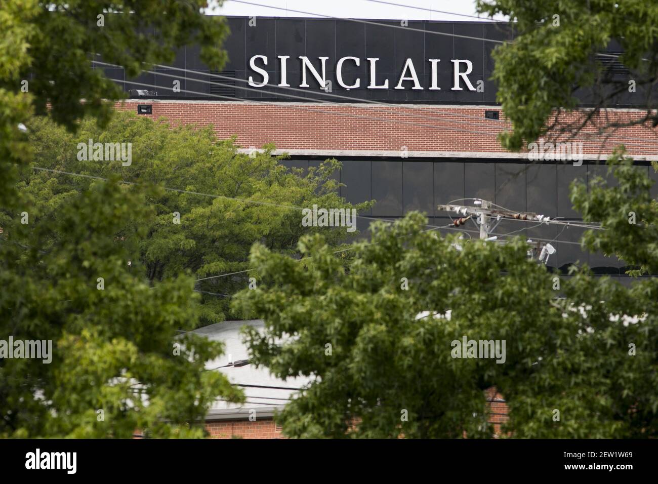 A logo sign outside of the headquarters of the Sinclair Broadcast Group ...