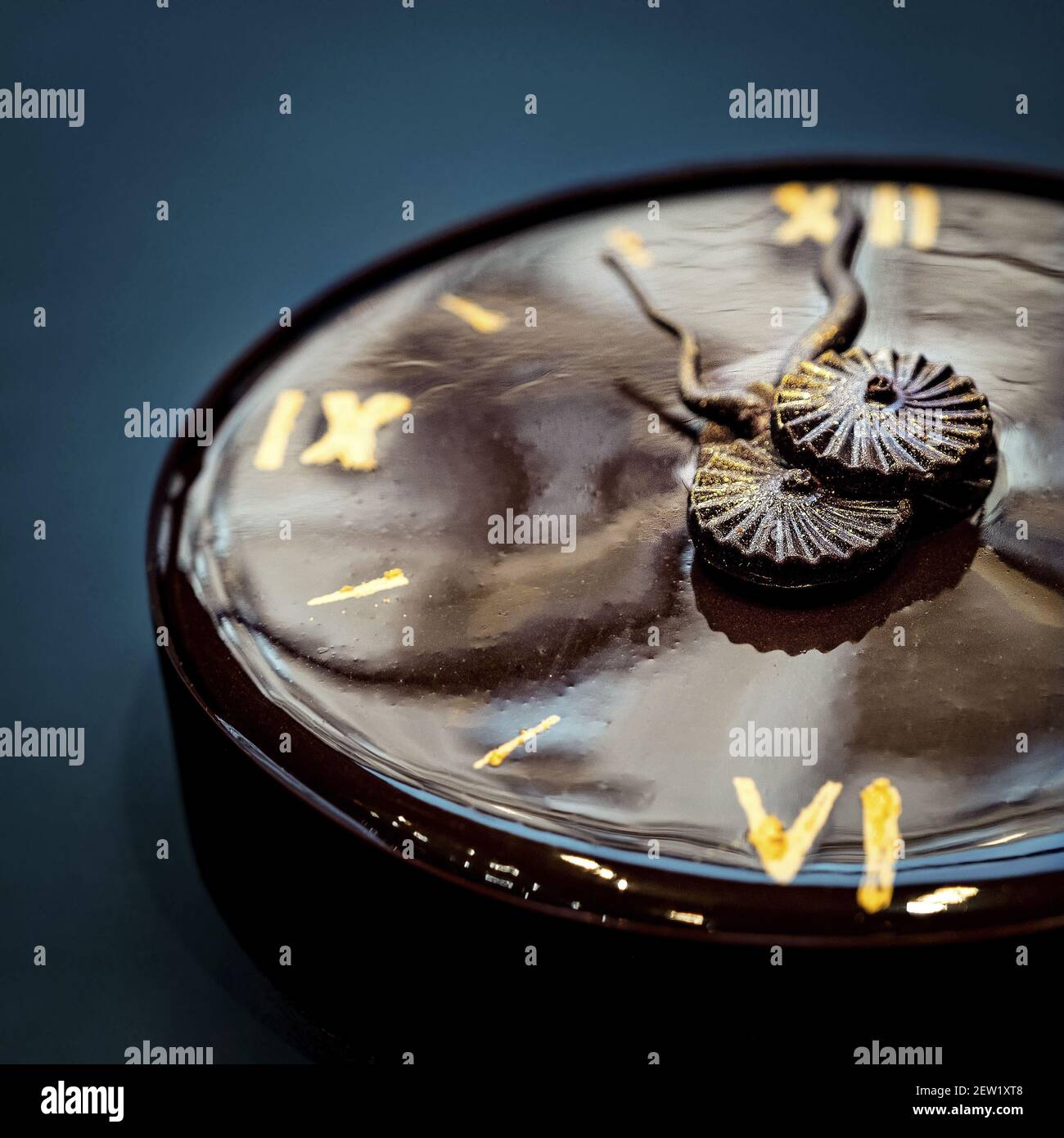 Clock shaped cake, chocolate ganache Stock Photo - Alamy