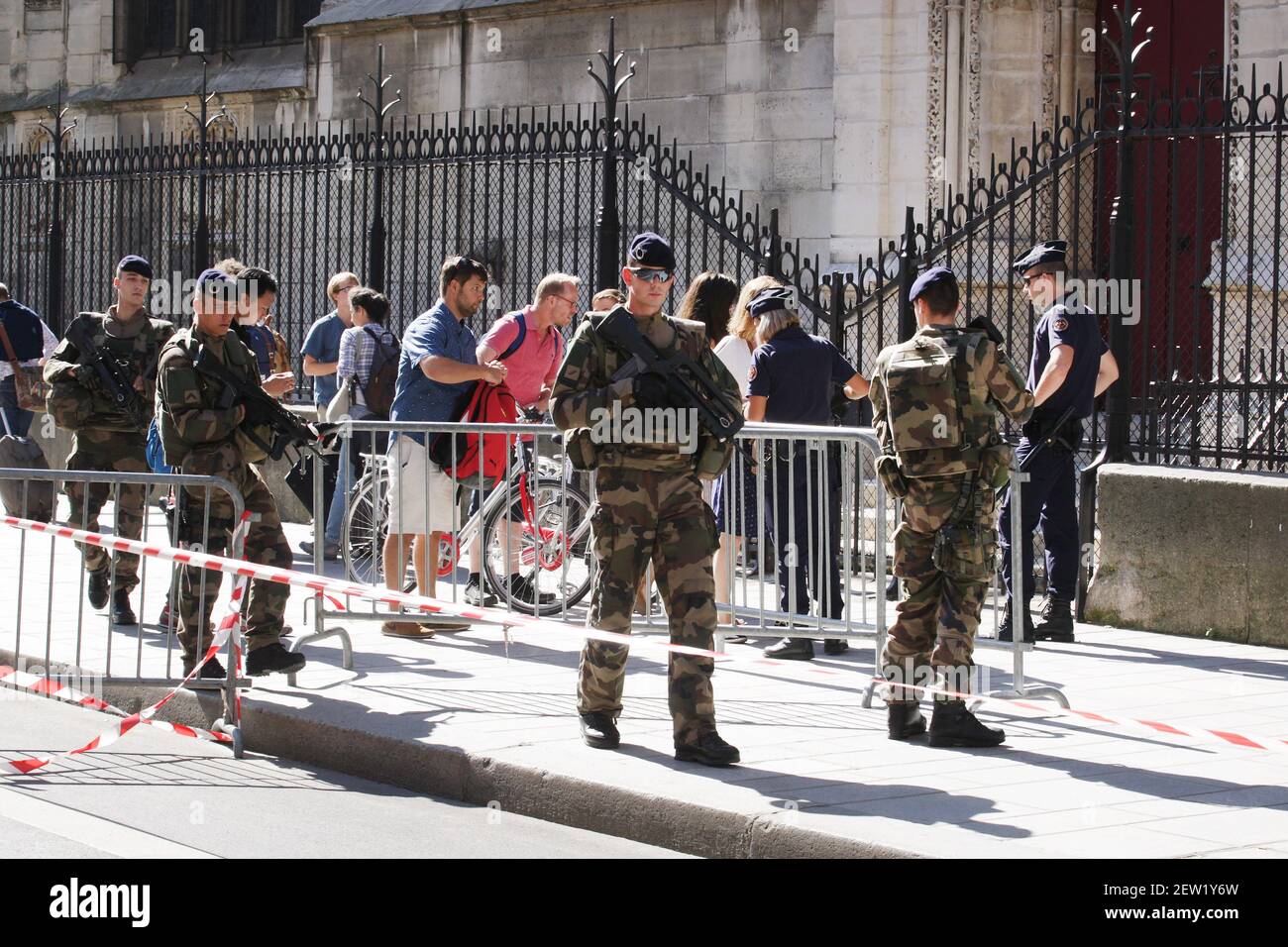 French Army soldiers and police officers patrol the area around of the ...