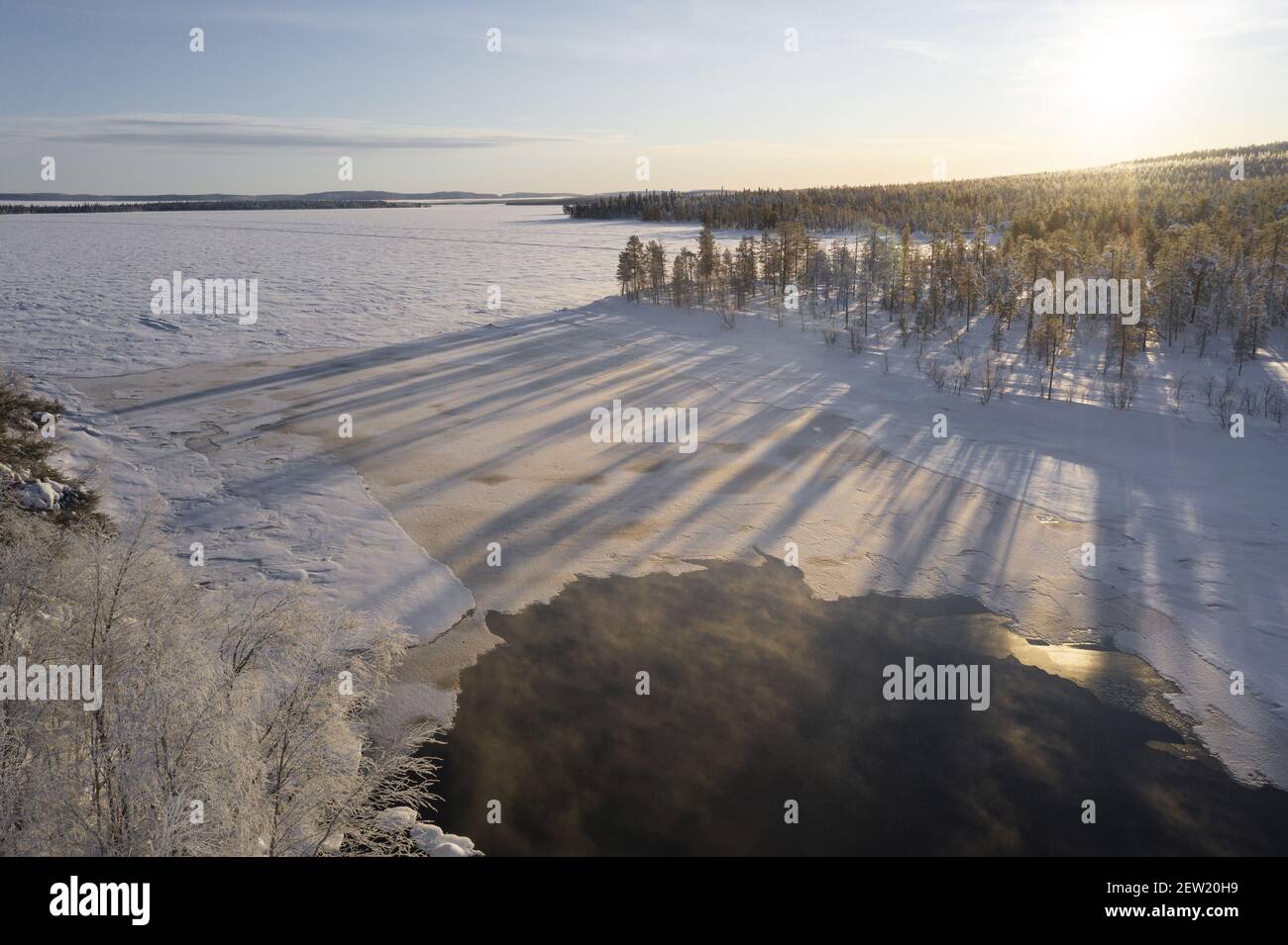 Finlande, Lapland, Kittila, snowy landscape and frozen river (aerial ...