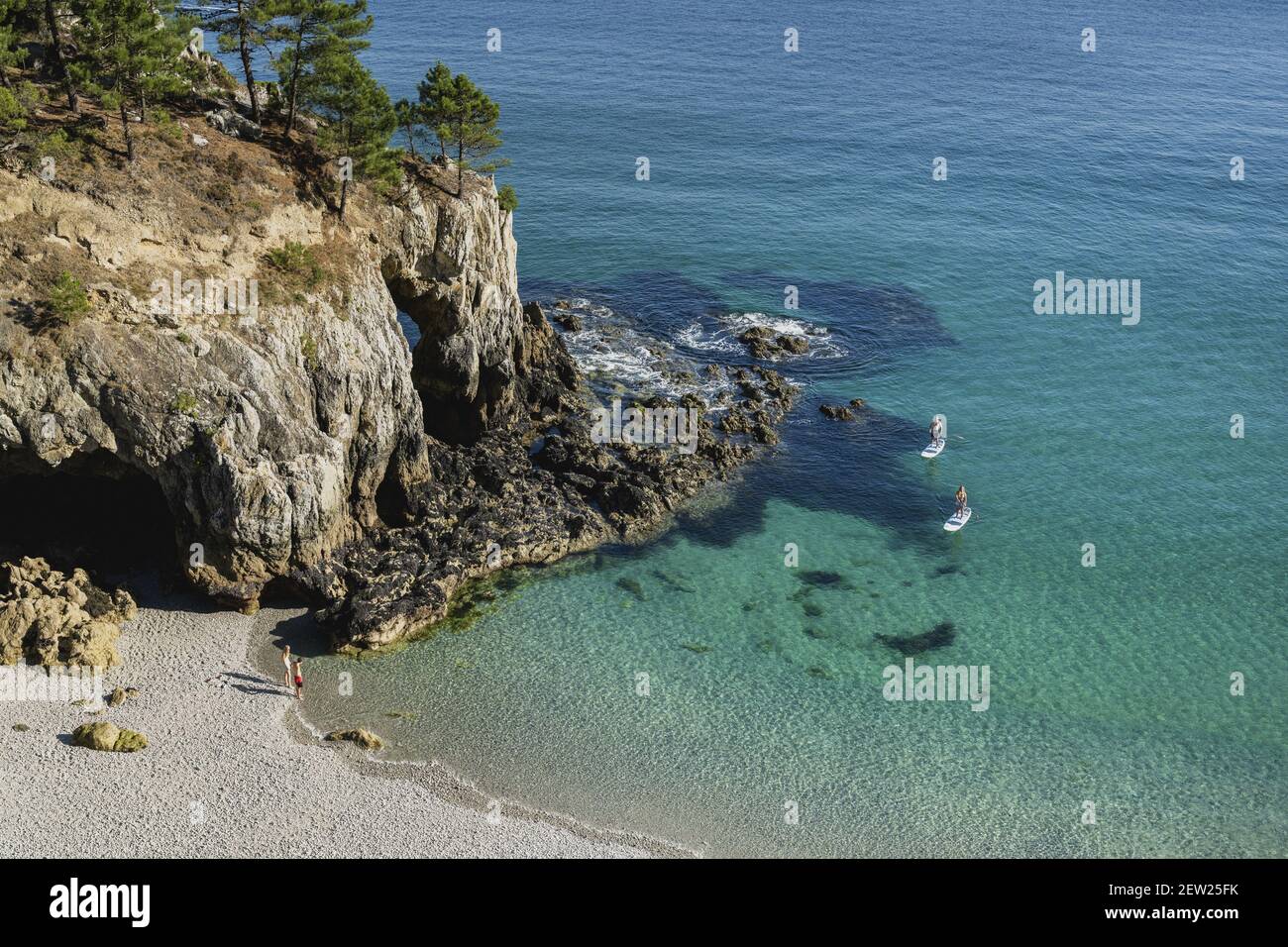 France, Finistere, Crozon, paddle boarding on the Crozon peninsula at ...