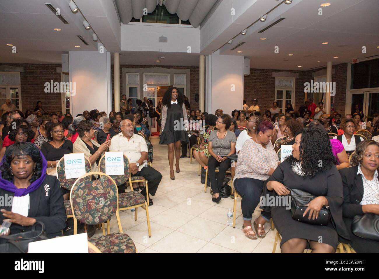 Director Tasha Smith is introduced at TV One's DC Premiere of When Love ...