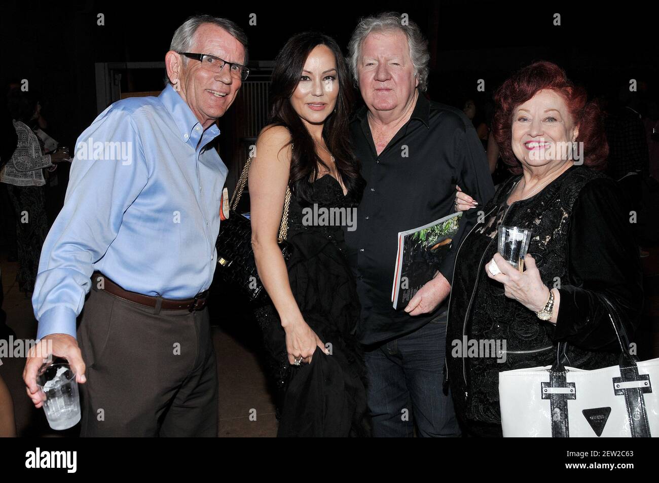 (L-R) Guest, TV Producers Lisa Lew and Peter Brennan and Mom Jean ...