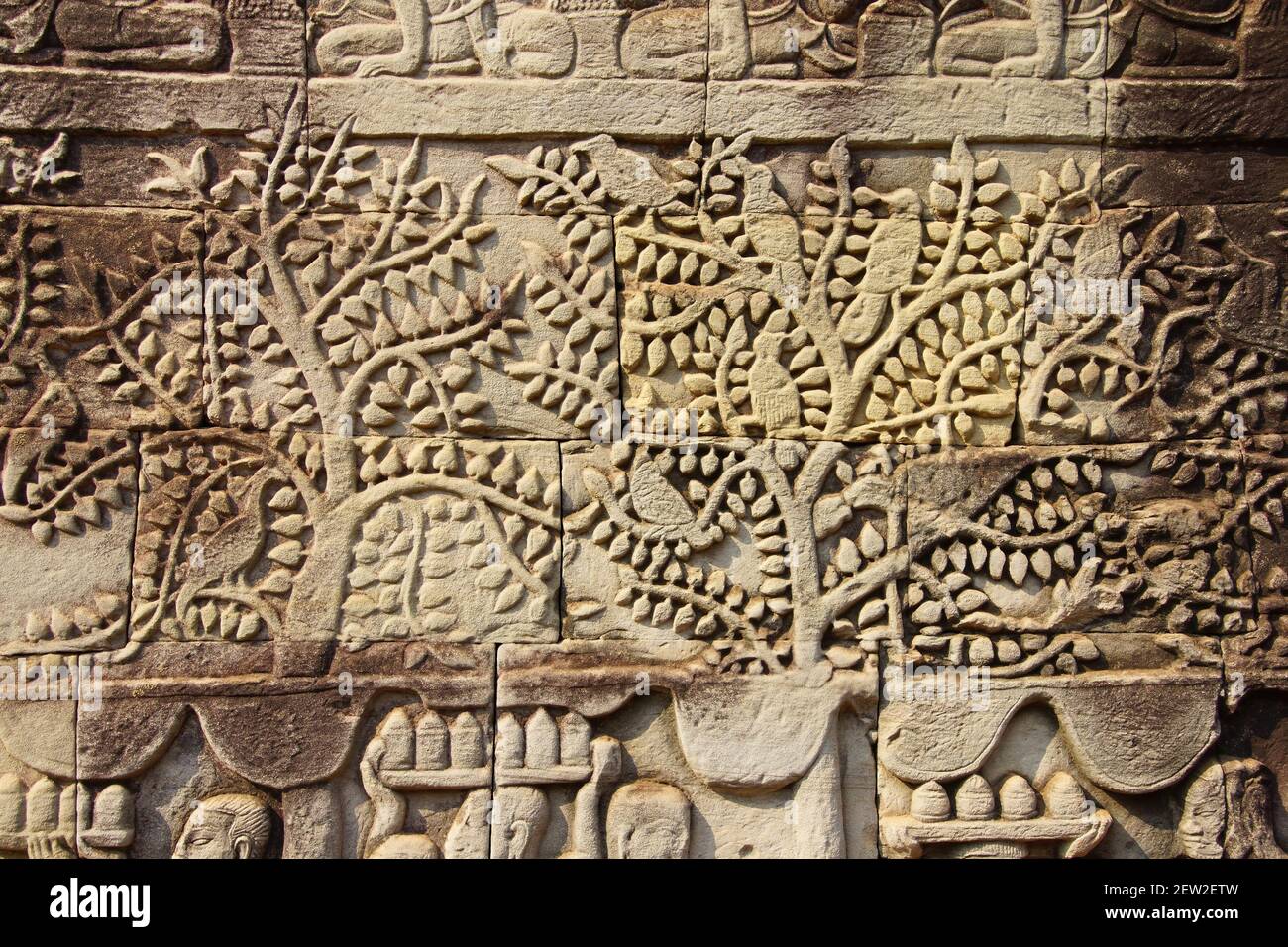 A closeup of ancient bas relief in Angkor Wat temple, Cambodia Stock ...
