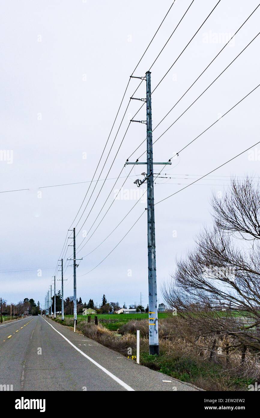 A line of steel utility poles on Franklin Blvd in Scramento county in ...