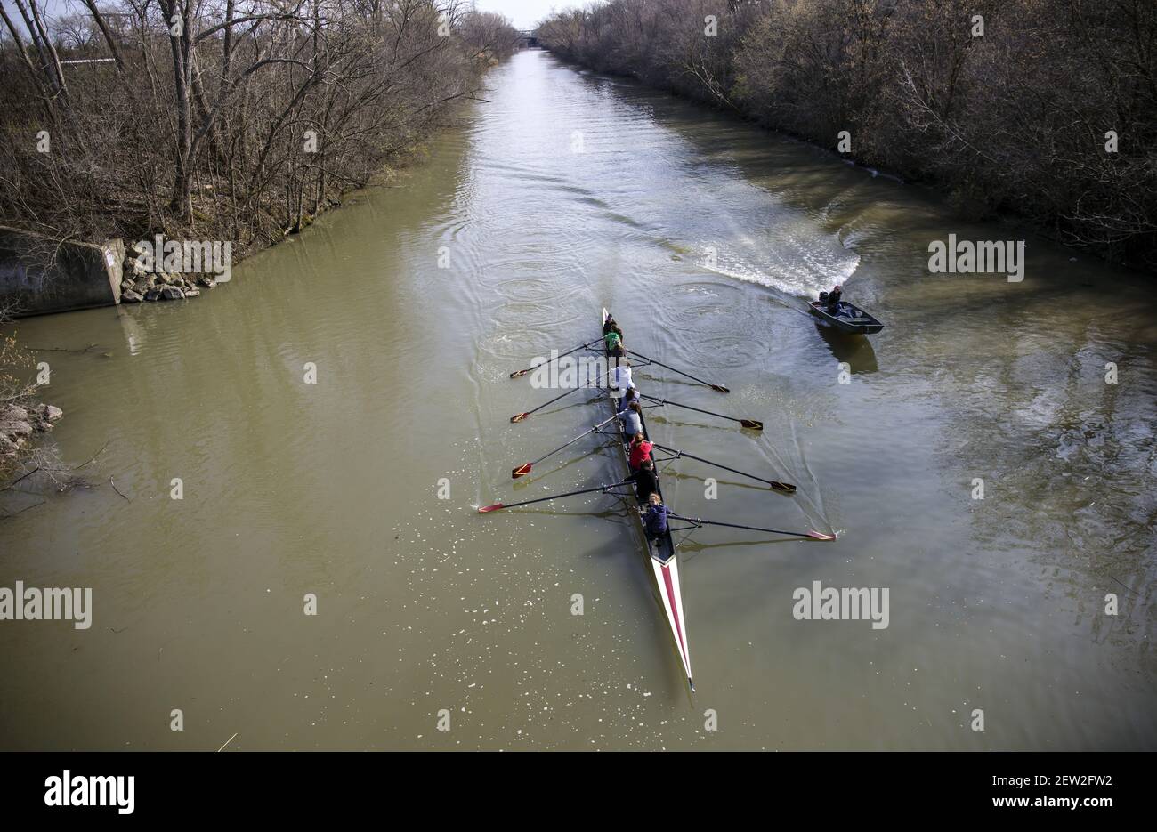 A high school rowing team practices on the North Shore Channel, where ...
