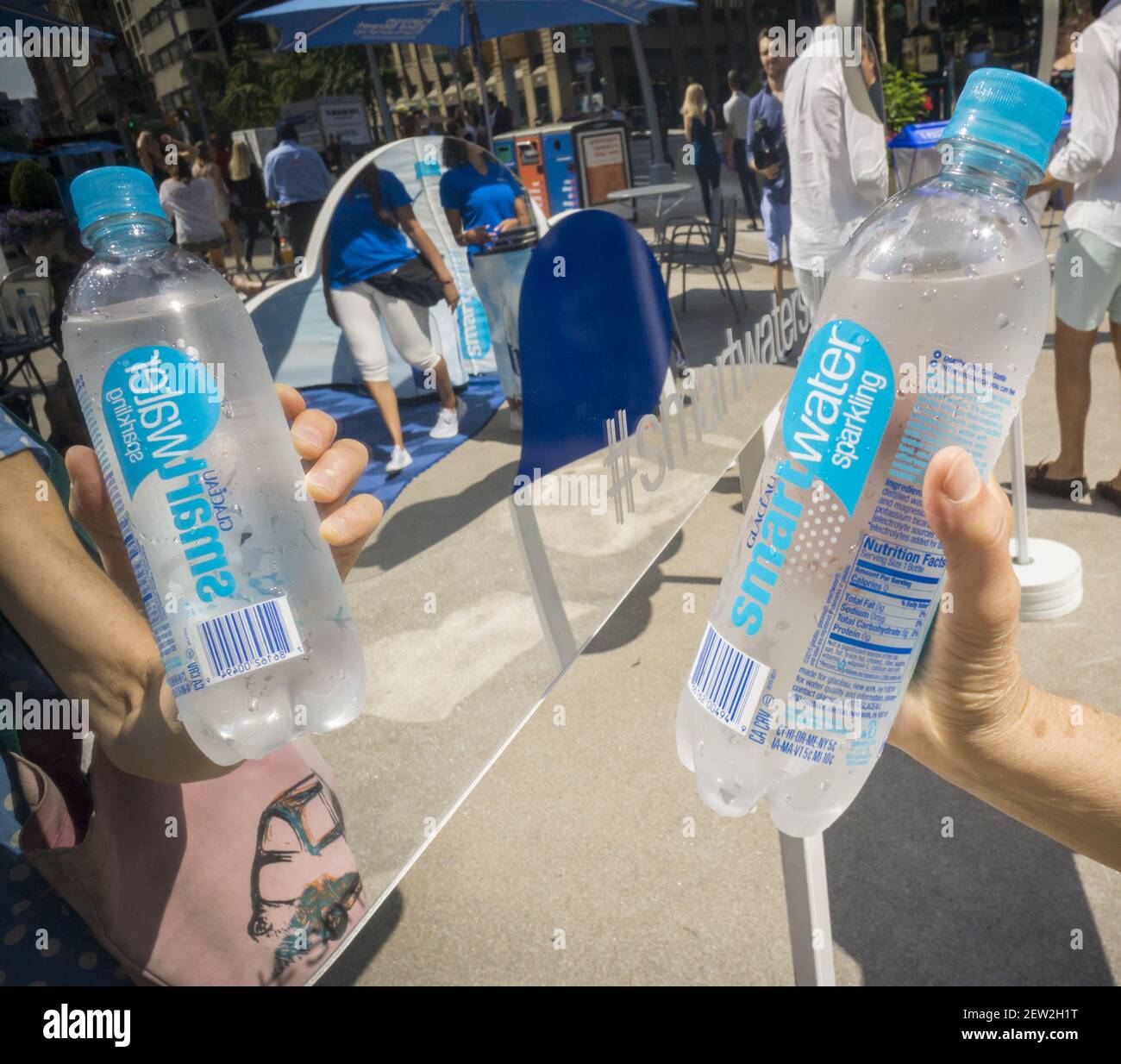 Visitors at a SmartWater branding event in Flatiron Plaza in New York ...