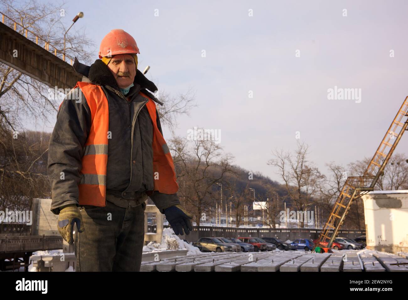 Ukrainian workers at the factory of reinforced concrete products ...