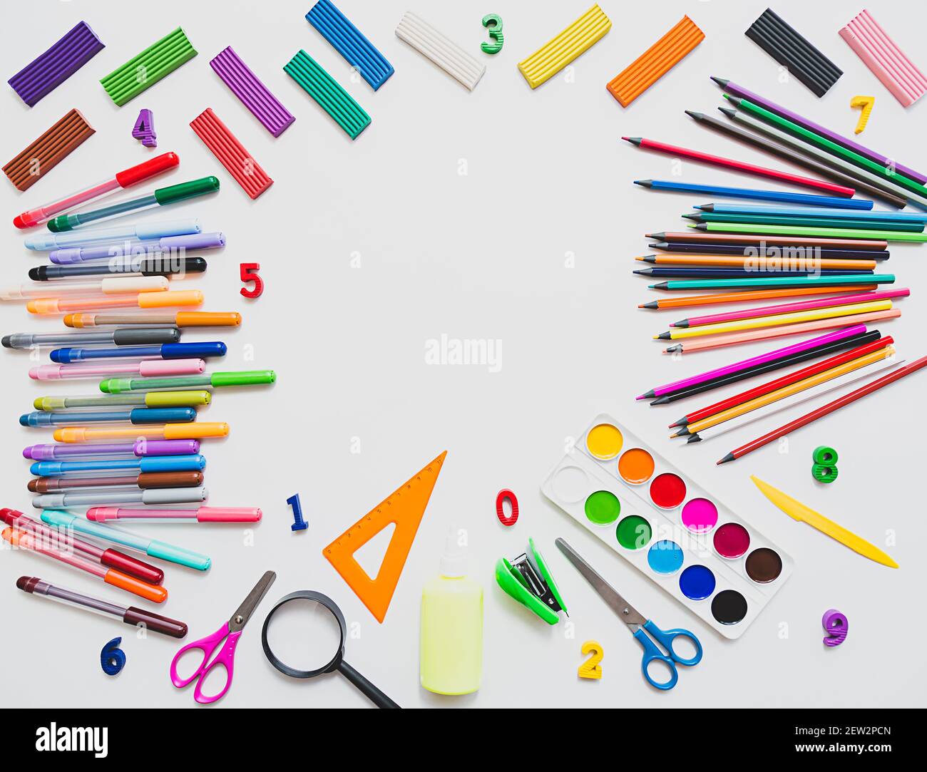 Bright still life scene of stationery on a white background. Colored ...