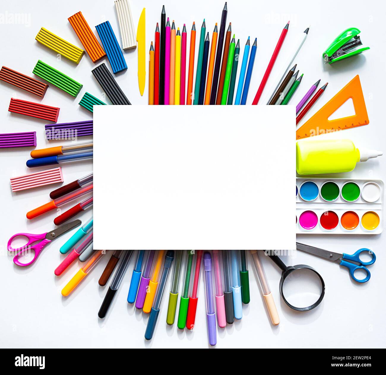 Bright still life scene of stationery on a white background. Colored ...