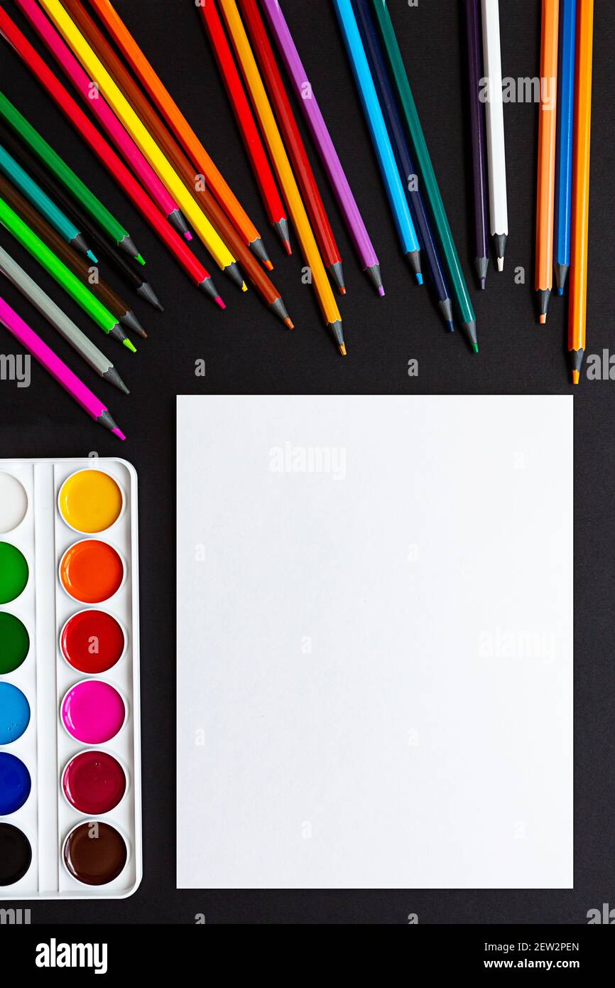 Blank sheet of paper, colored pencils and paints. Mock up, flat lay ...