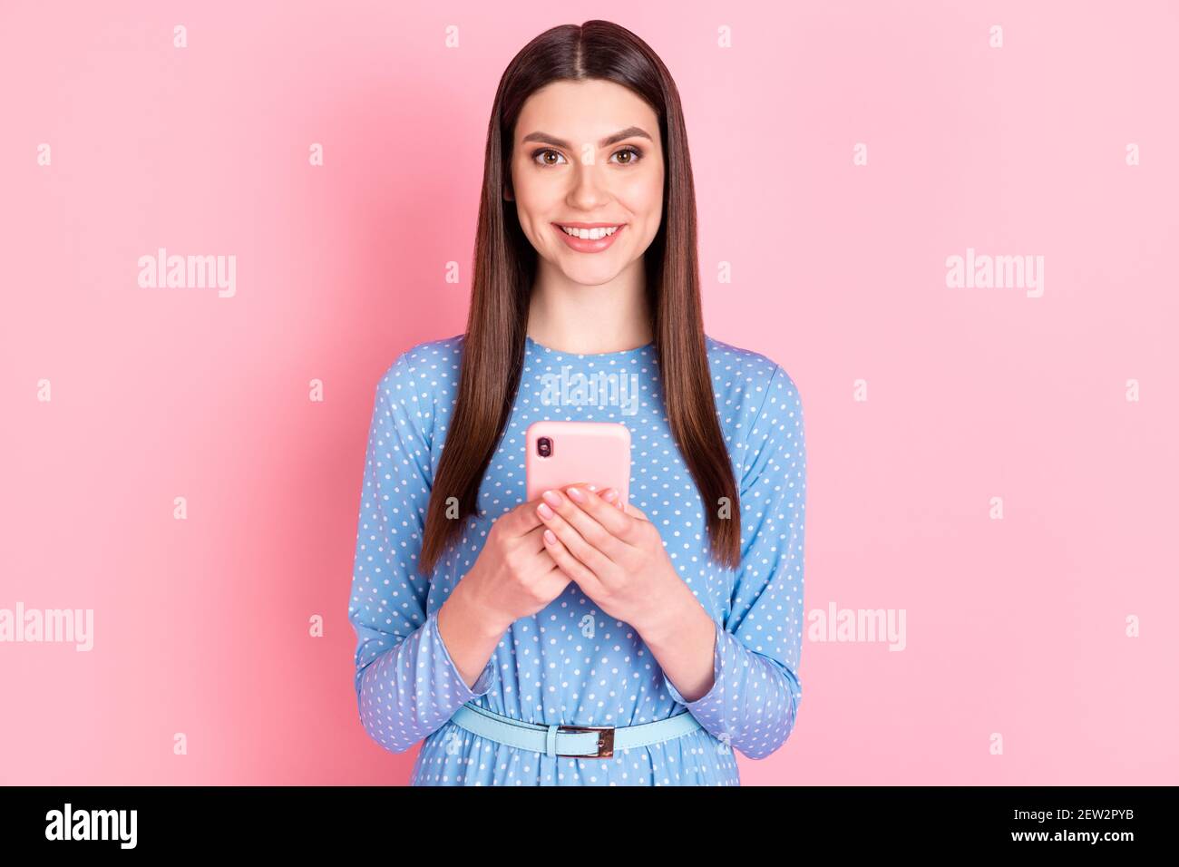 Photo of young lovely charming smiling good mood girl blogger using ...