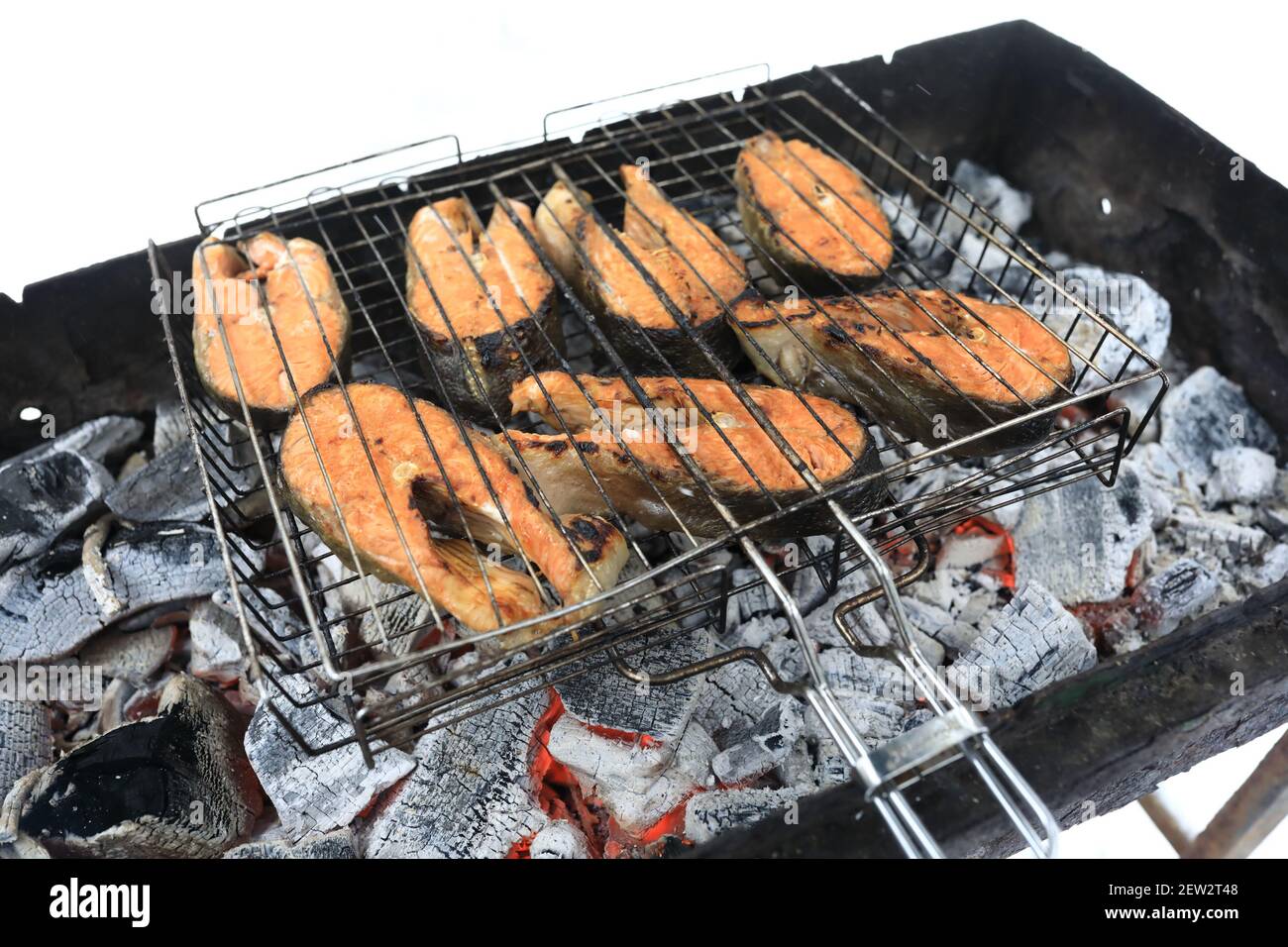 Salmon fillets on grill in hi-res stock photography and images - Alamy