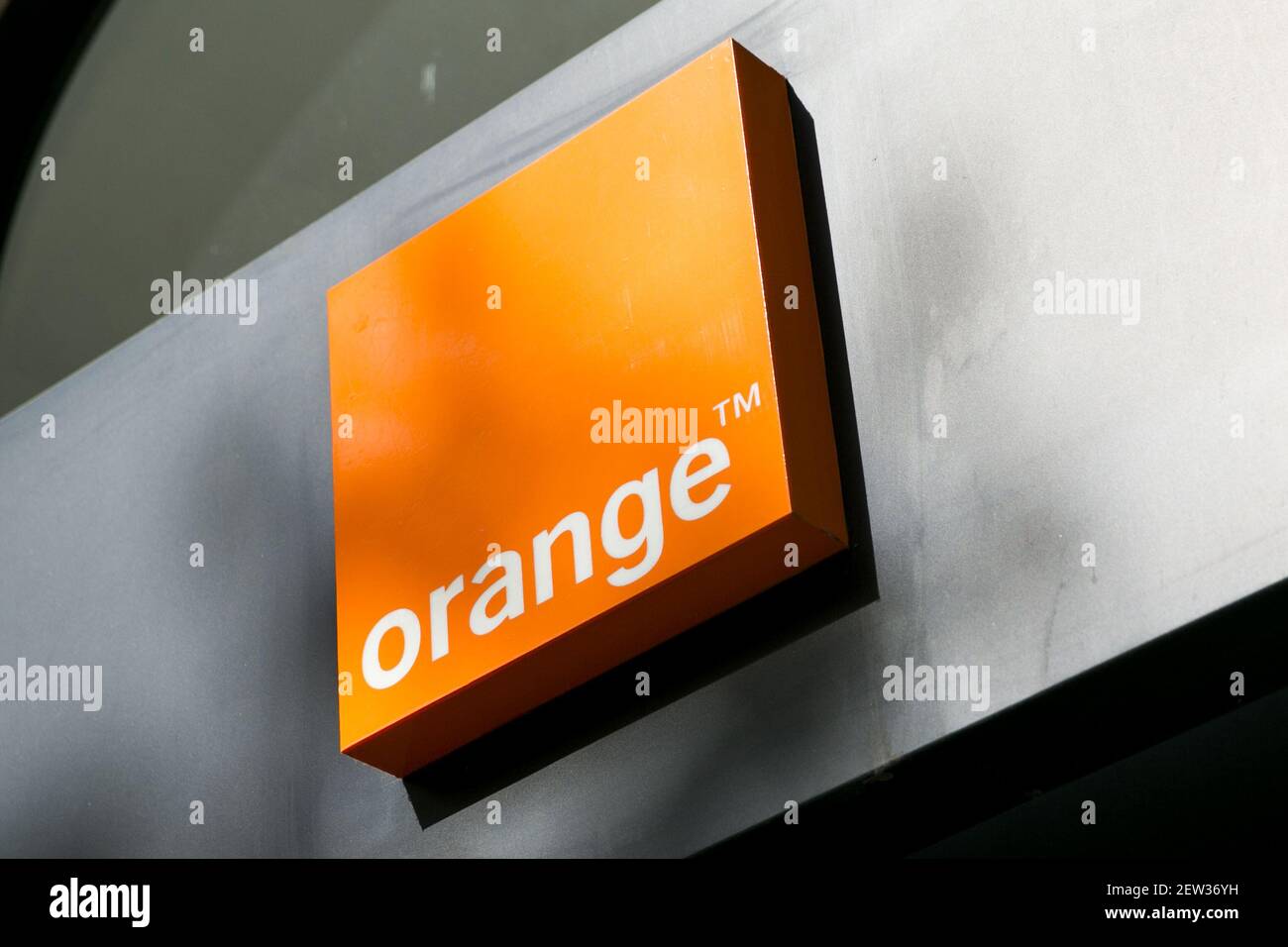 A logo sign outside of a Orange S.A., retail store in Barcelona, Spain ...