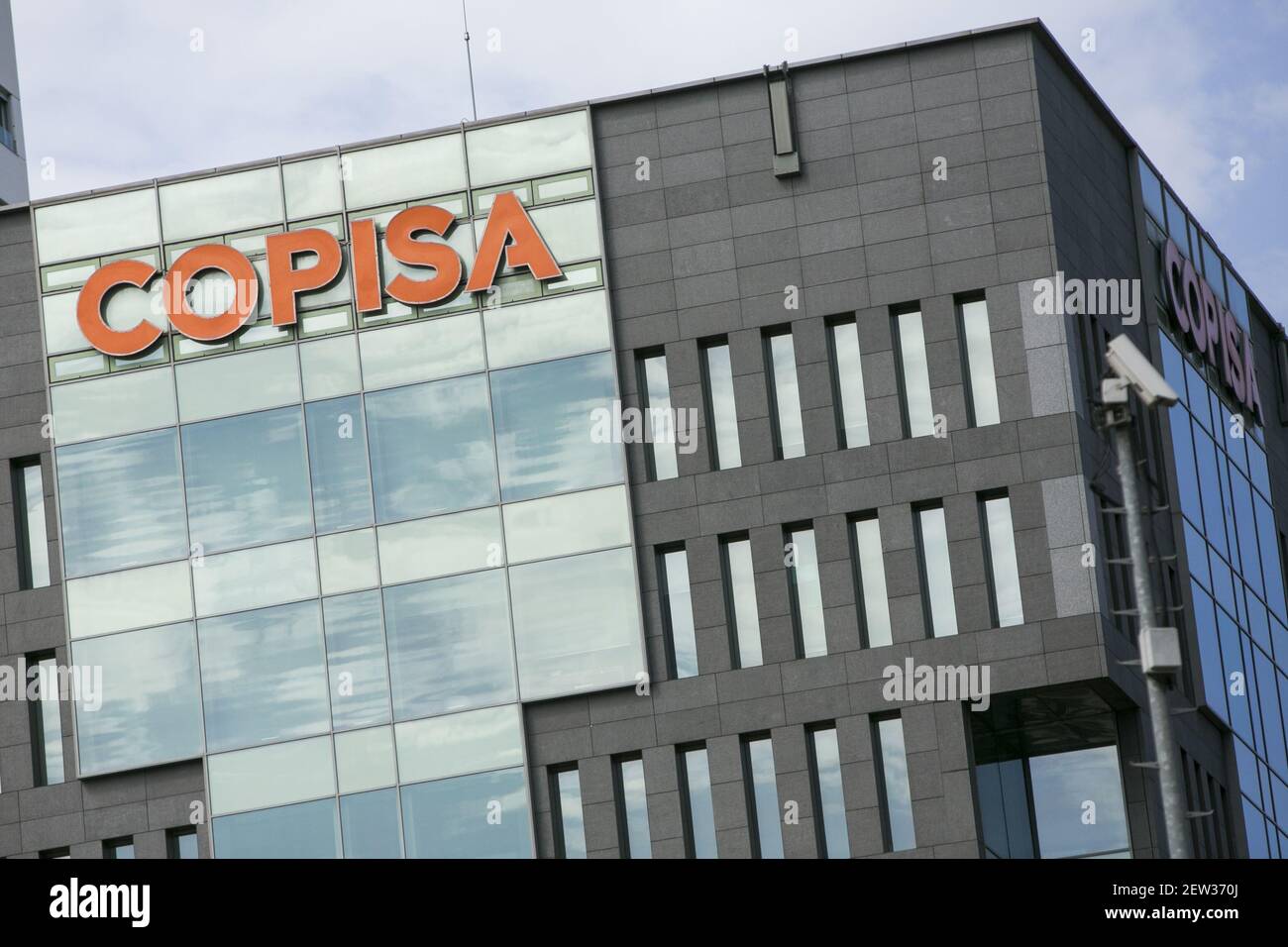 A logo sign outside of the headquarters of Grupo Copisa in Barcelona ...