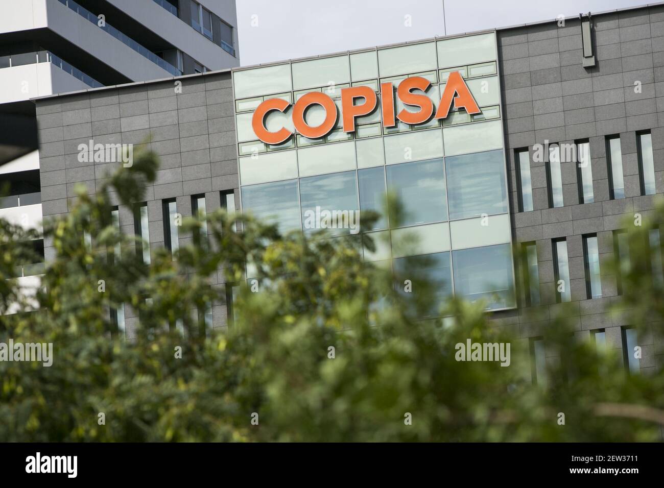 A logo sign outside of the headquarters of Grupo Copisa in Barcelona ...