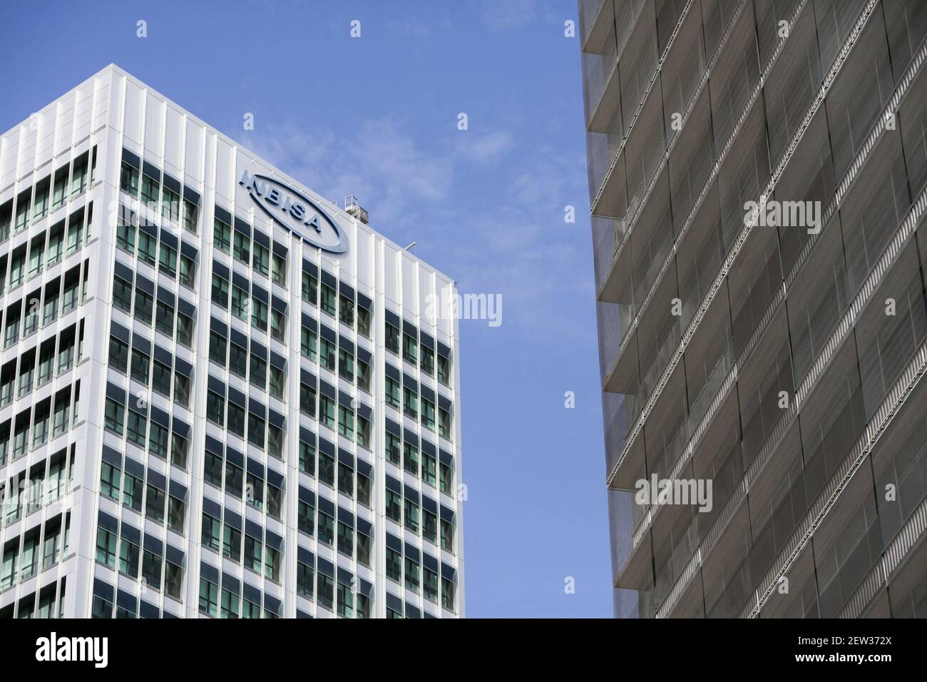 A logo sign outside of the headquarters of INBISA Construccion in ...