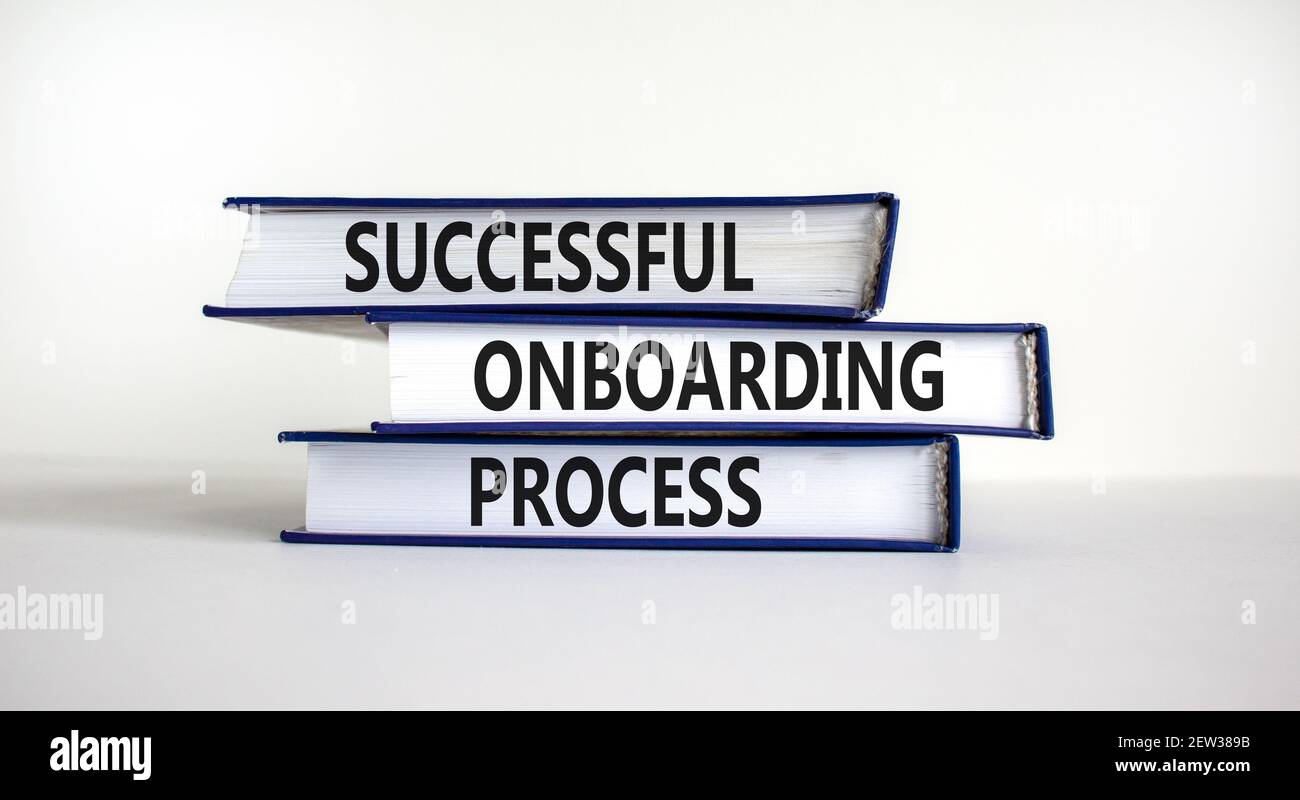 Successful onboarding process symbol. Books with words 'Successful ...