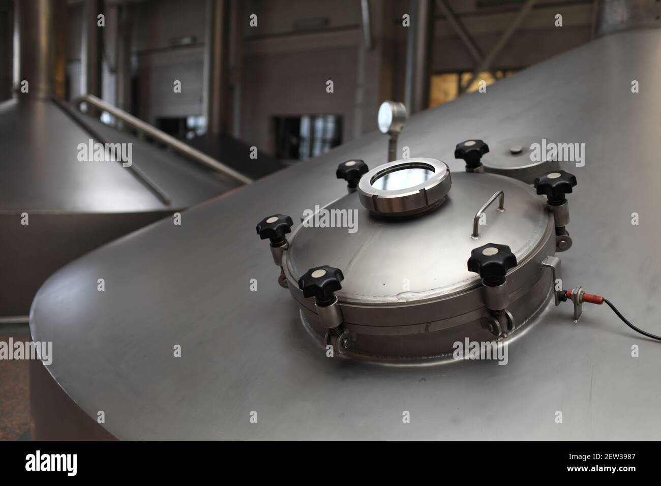 Details manhole of fermentation vat in the modern brewery Stock Photo ...