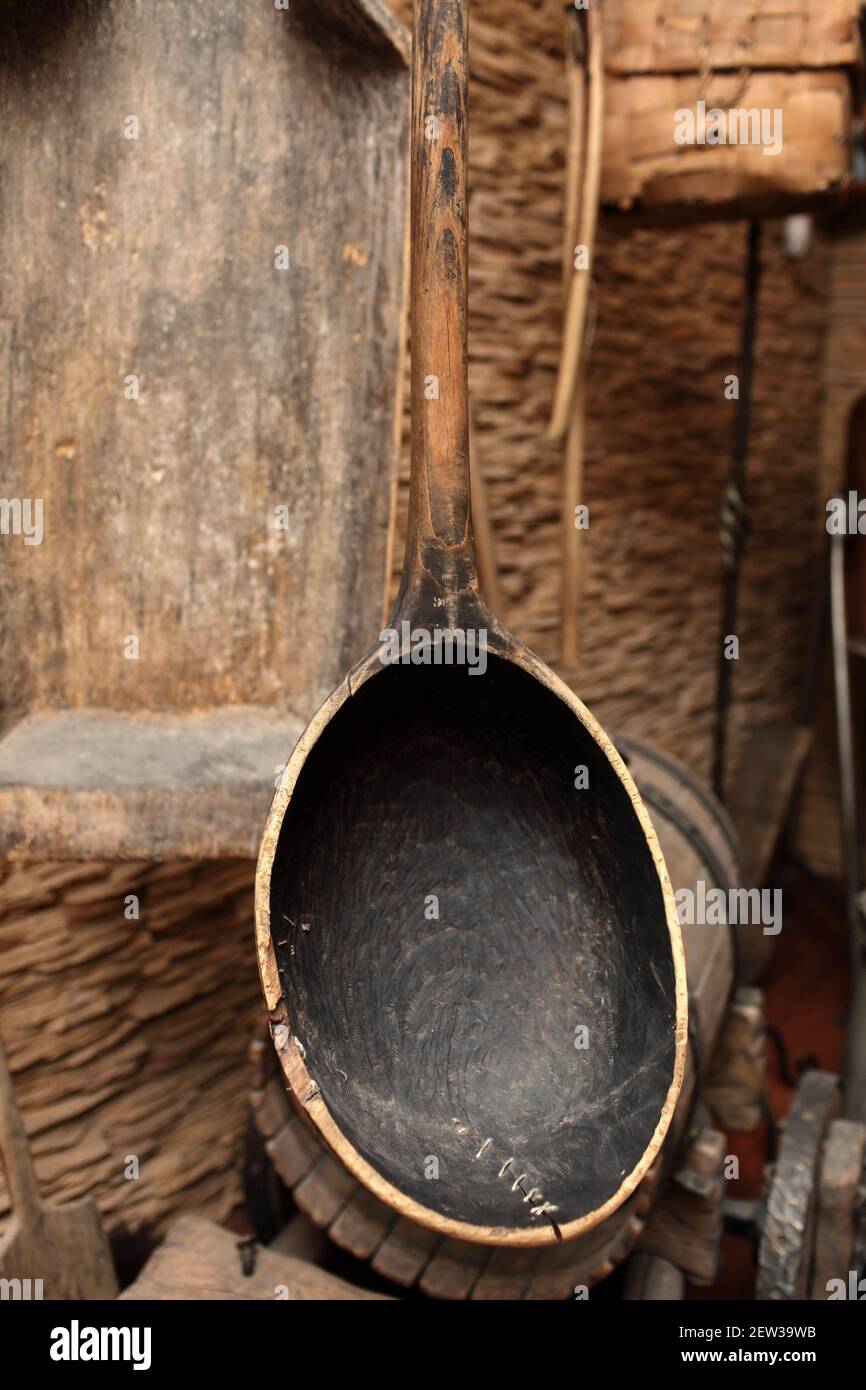Details of the old wooden ladle in the museum Stock Photo - Alamy