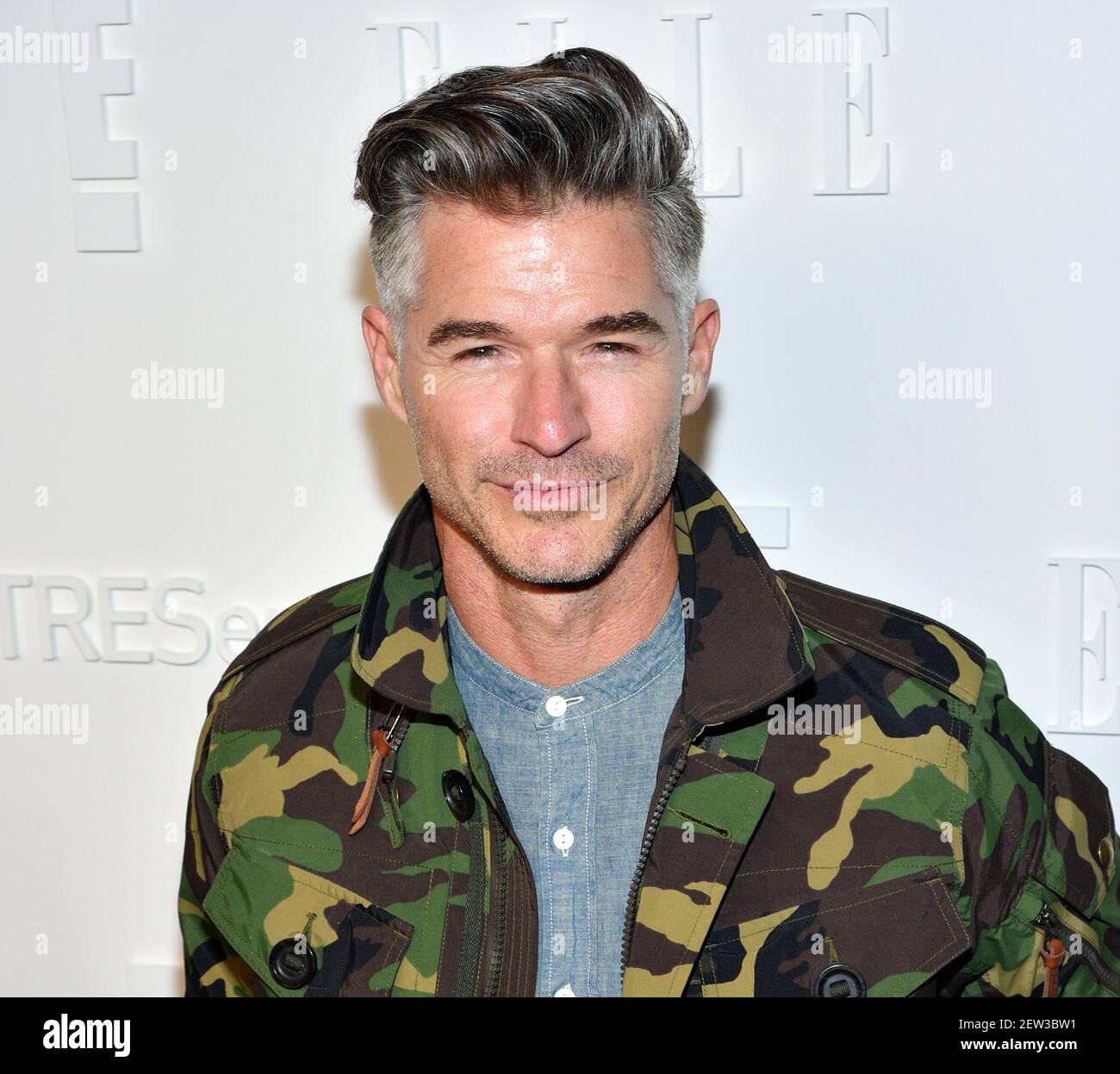 Model Eric Rutherford attends the E!, ELLE and IMG Celebration of ...