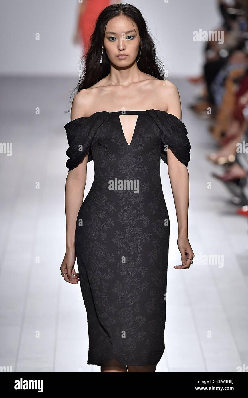 Model Yue Han walks on the runway during the Tadashi Shoji Fashion show ...