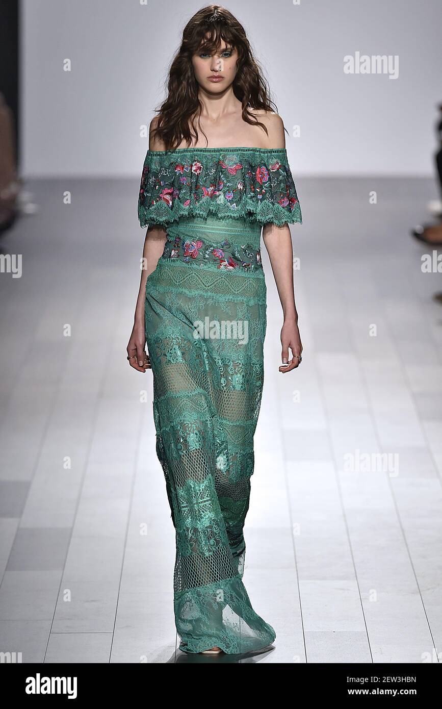 Model Aleyna Fitzgerald walks on the runway during the Tadashi Shoji ...