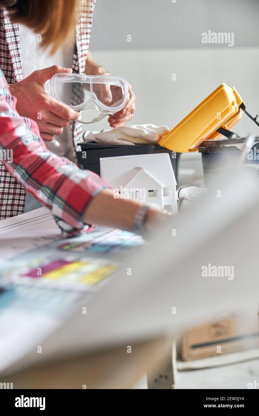 Two professional interior designers modifying a house plan Stock Photo ...