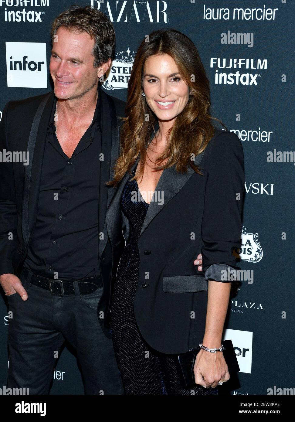 L-R: Rande Gerber and model Cindy Crawford attend the Harper's Bazaar ...