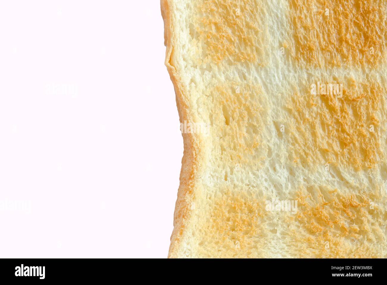 The texture and detail of the white toasted bread is the golden yellow ...