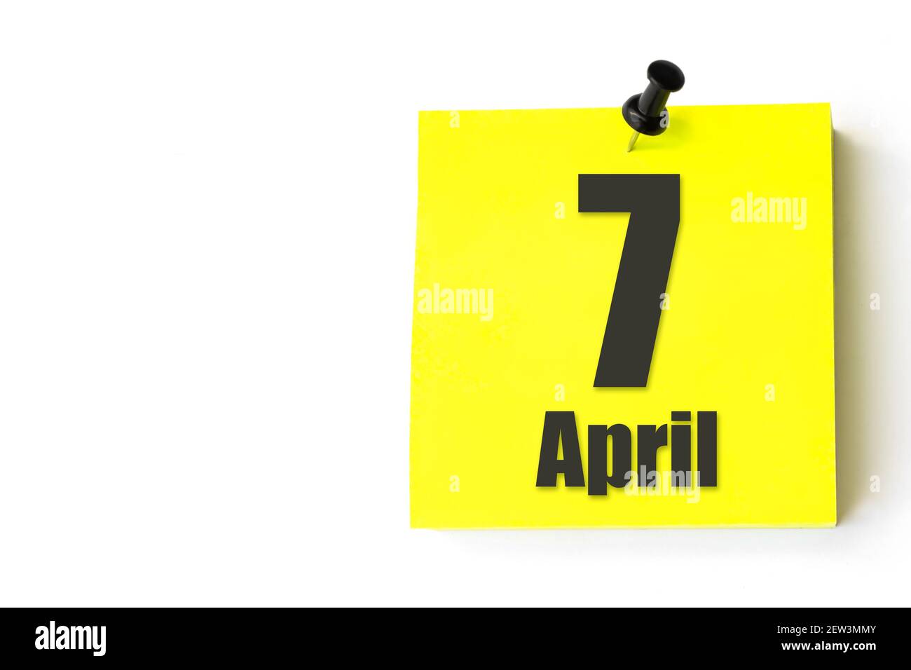April 7th. Day 7 of month, Calendar date. Yellow sheet of the calendar ...