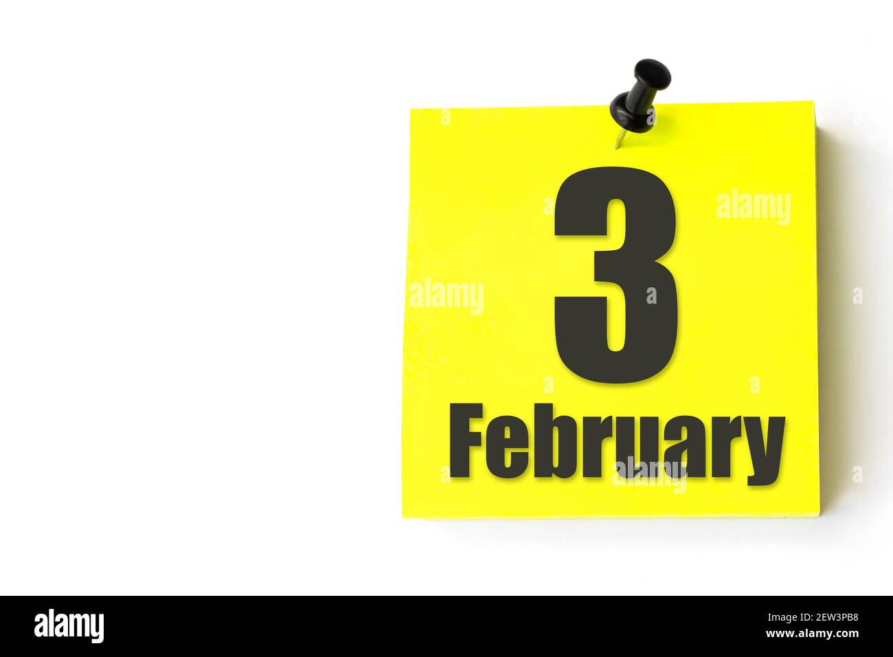 February 3rd. Day 3 of month, Calendar date. Yellow sheet of the ...