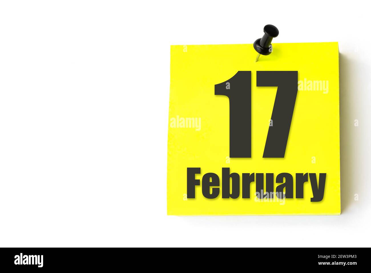 February 17th. Day 17 of month, Calendar date. Yellow sheet of the ...