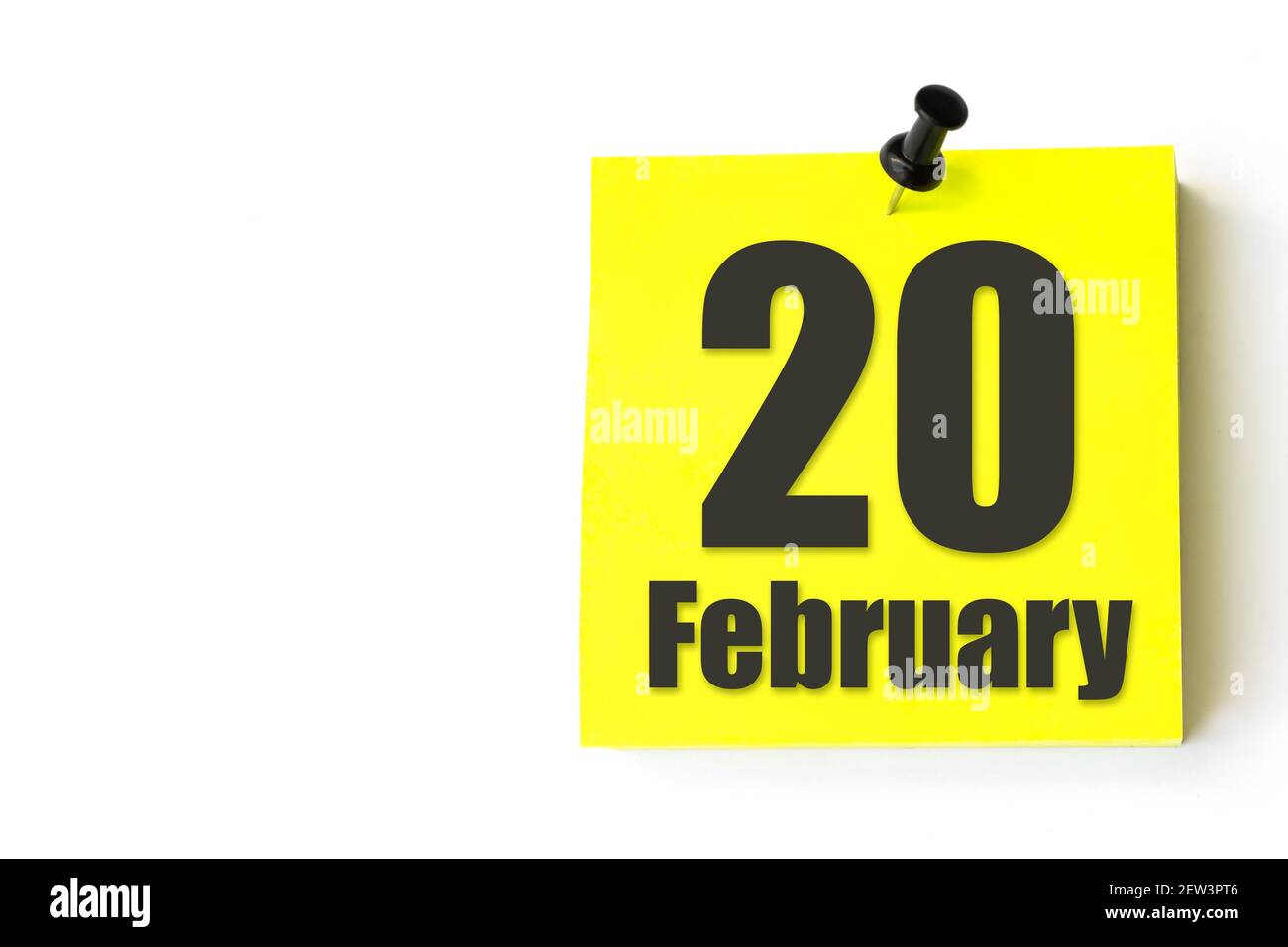 February 20th. Day 20 of month, Calendar date. Yellow sheet of the ...