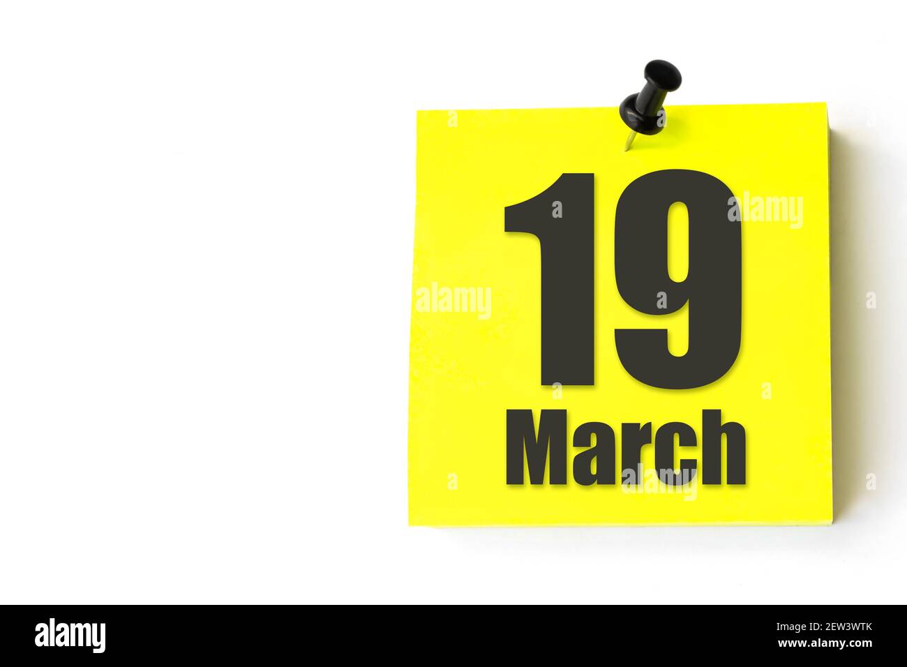 March 19th. Day 19 of month, Calendar date. Yellow sheet of the ...