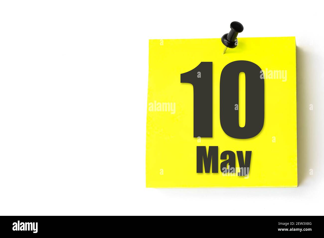 May 10th. Day 10 of month, Calendar date. Yellow sheet of the calendar ...