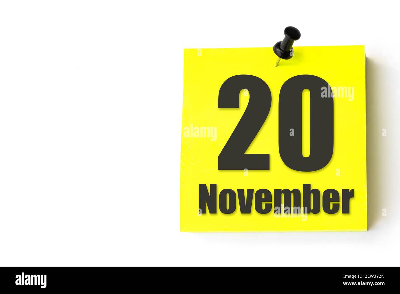 November 20th. Day 20 of month, Calendar date. Yellow sheet of the ...
