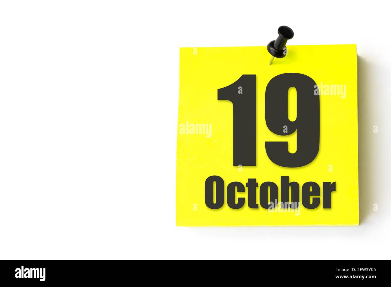 October 19th. Day 19 of month, Calendar date. Yellow sheet of the ...