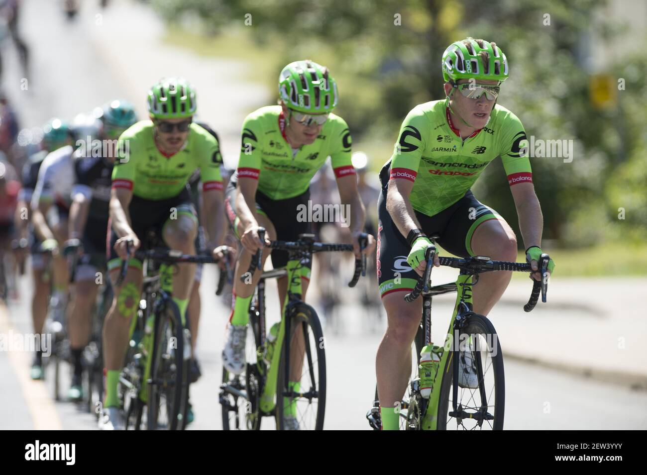 Lawson Craddock of Cannondale-Drapac leads the peloton on a climb ...