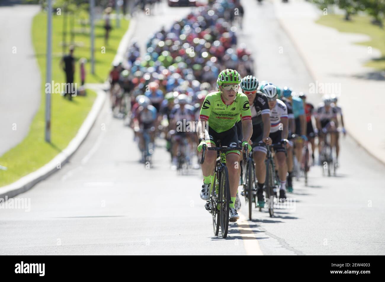 Lawson Craddock of Cannondale-Drapac leads the peloton on a climb ...