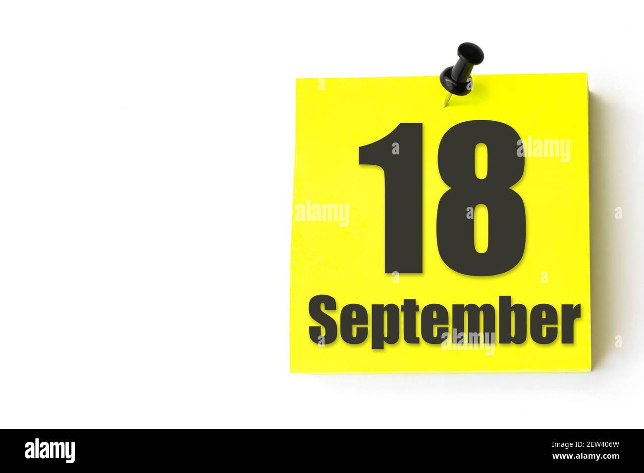 September 18th. Day 18 of month, Calendar date. Yellow sheet of the ...