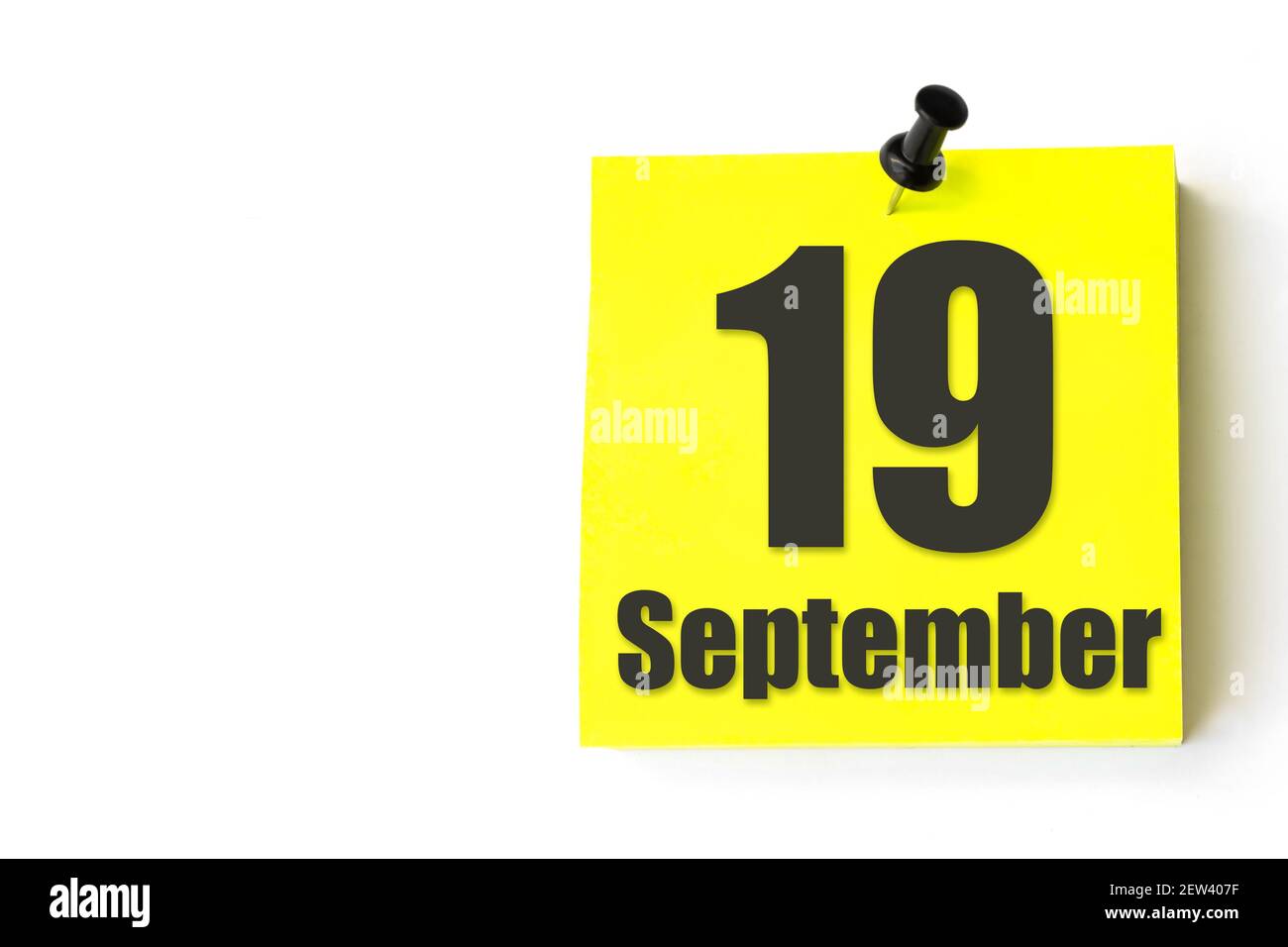 September 19th. Day 19 of month, Calendar date. Yellow sheet of the ...