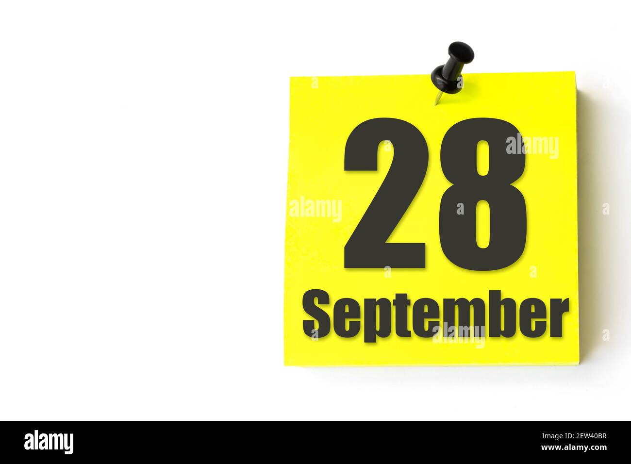 September 28th. Day 28 of month, Calendar date. Yellow sheet of the ...