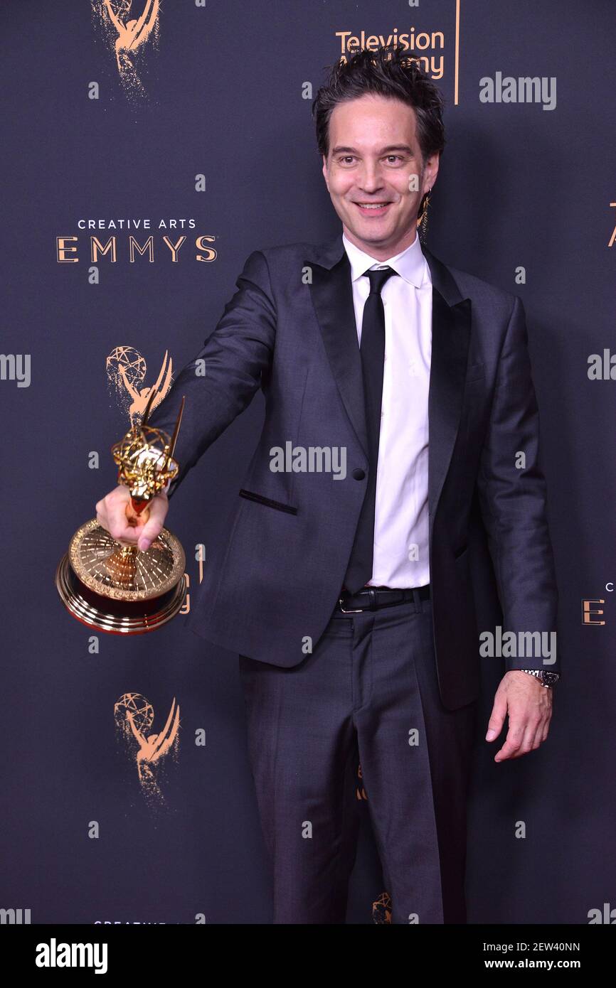 Jeff Russo poses in the press room with the award for outstanding music ...
