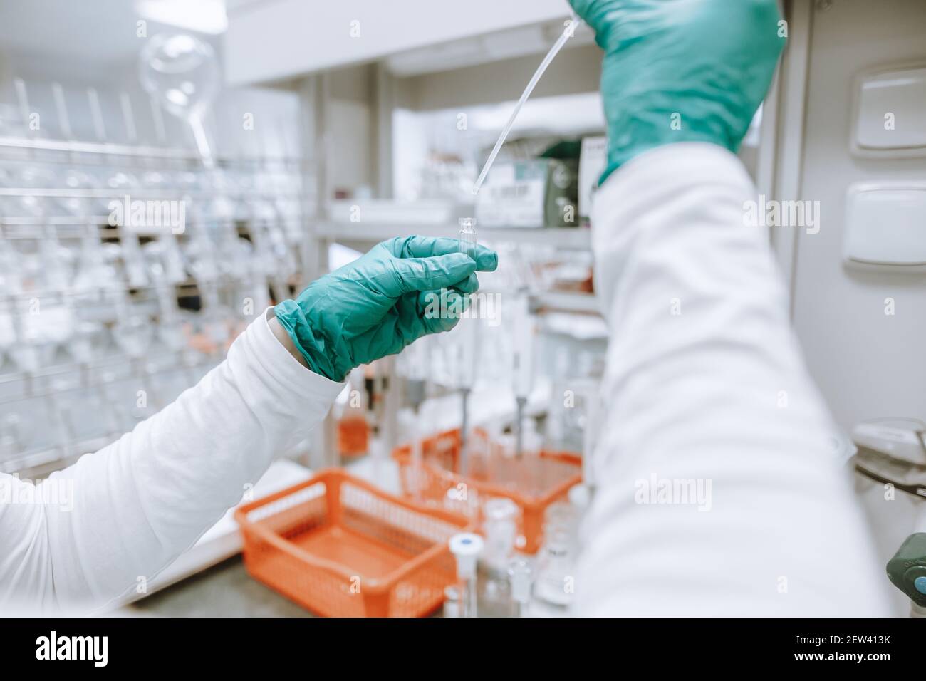 Pharmaceutist testing of a new drugs and pills in the pharmacy ...