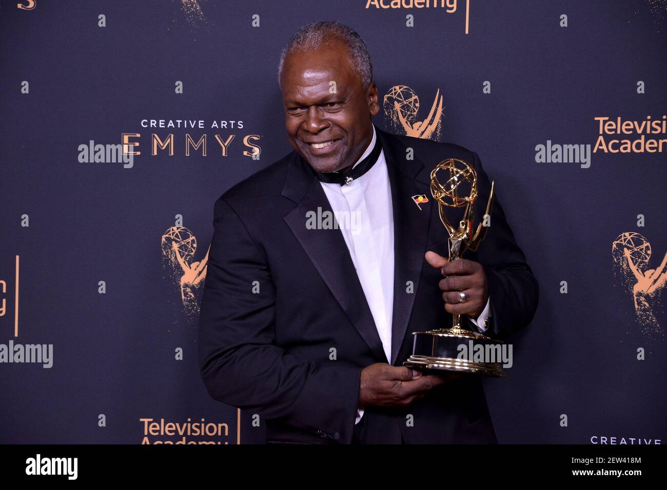 Actor Kim Estes poses in the press room with accepts the award for ...