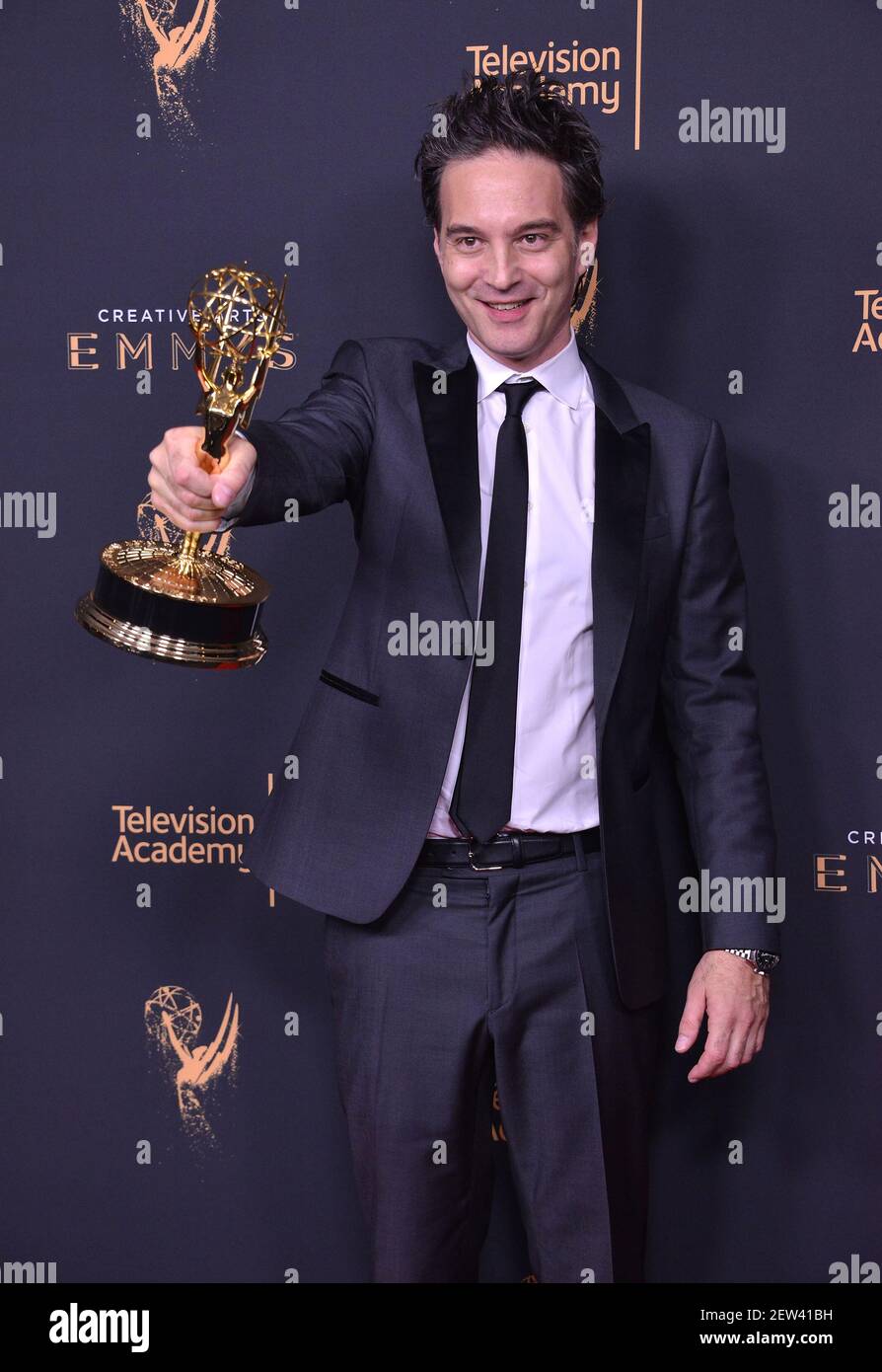 Jeff Russo poses in the press room with the award for outstanding music ...