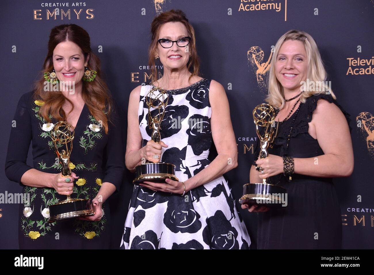 Alex Friedberg, from left, Patricia McLaughlin and Risa Garcia pose in ...